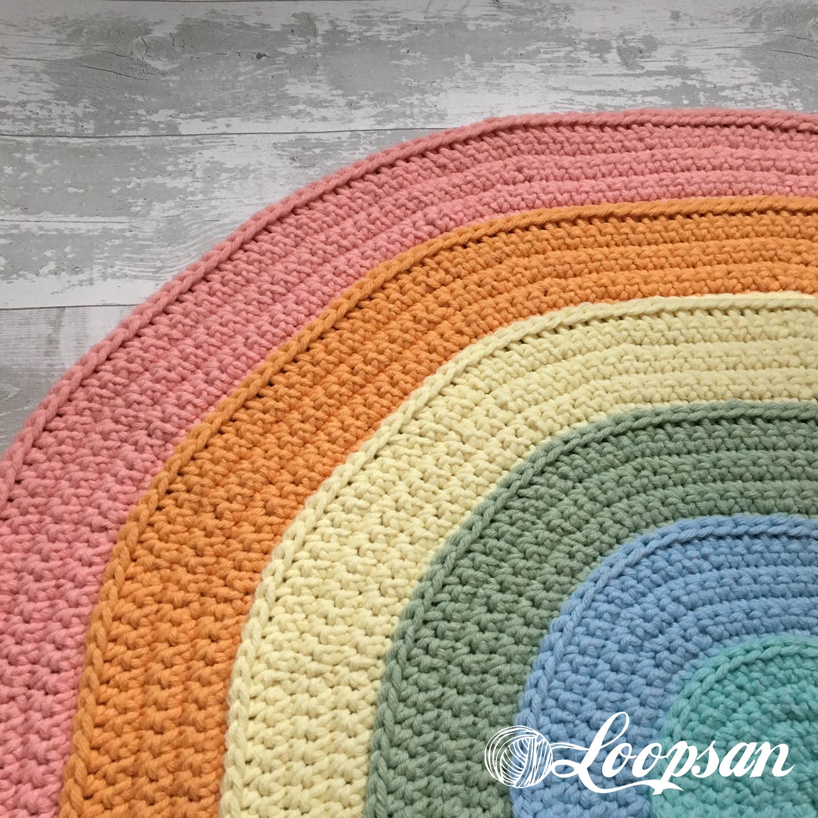 Pastel rainbow crochet rug
